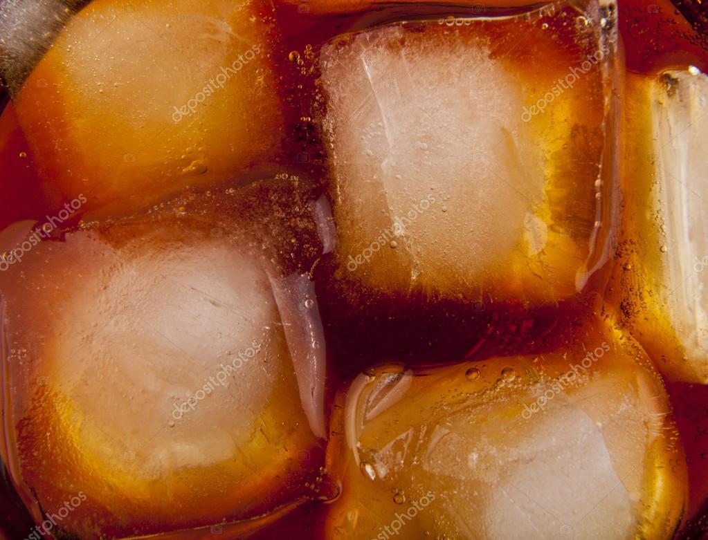 Cola with ice cubes Stock Photo by ©valzan 115731732