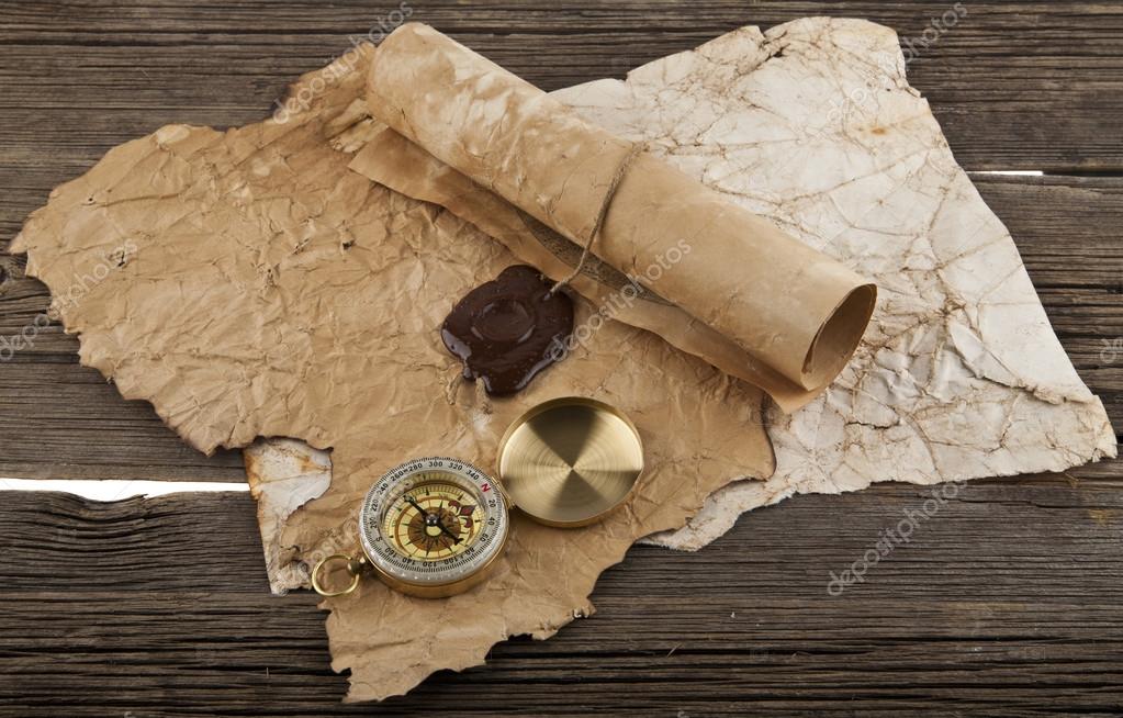 Compass on old paper Stock Photo by ©valzan 115736288
