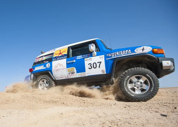 Off-road trucks competing in a desert rally – Stock Editorial Photo ...
