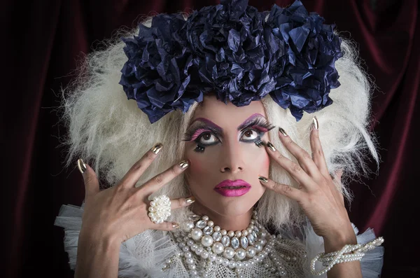 Drag queen with spectacular makeup, glamorous trashy look, posing ...