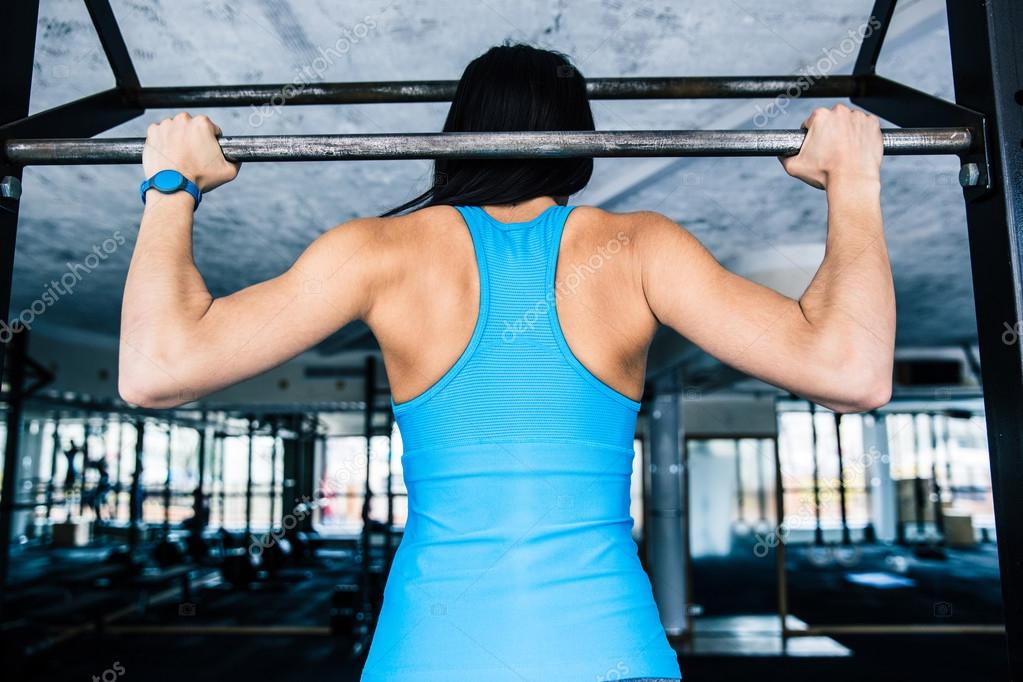 Back view portrait of a woman working out Stock Photo by ©Vadymvdrobot ...