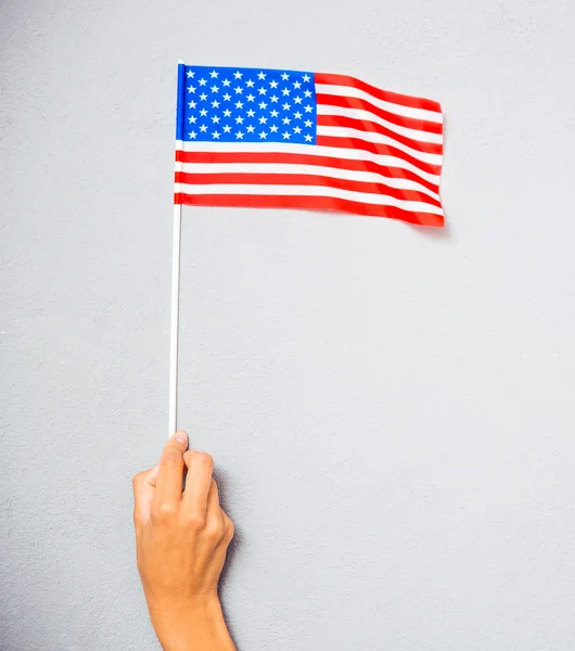Hand holding american flag Stock Photos, Royalty Free Hand holding ...