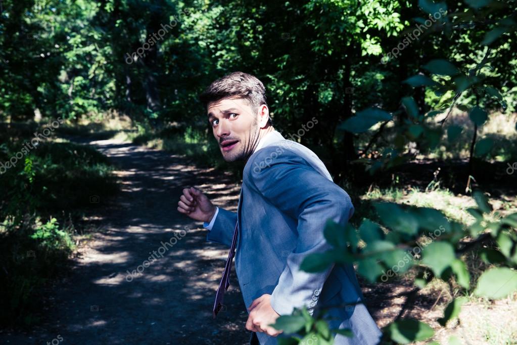 Empresario huyendo de algo: fotografía de stock © Vadymvdrobot ...