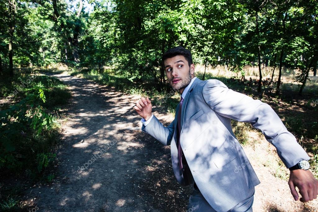 Empresario huyendo de algo: fotografía de stock © Vadymvdrobot ...