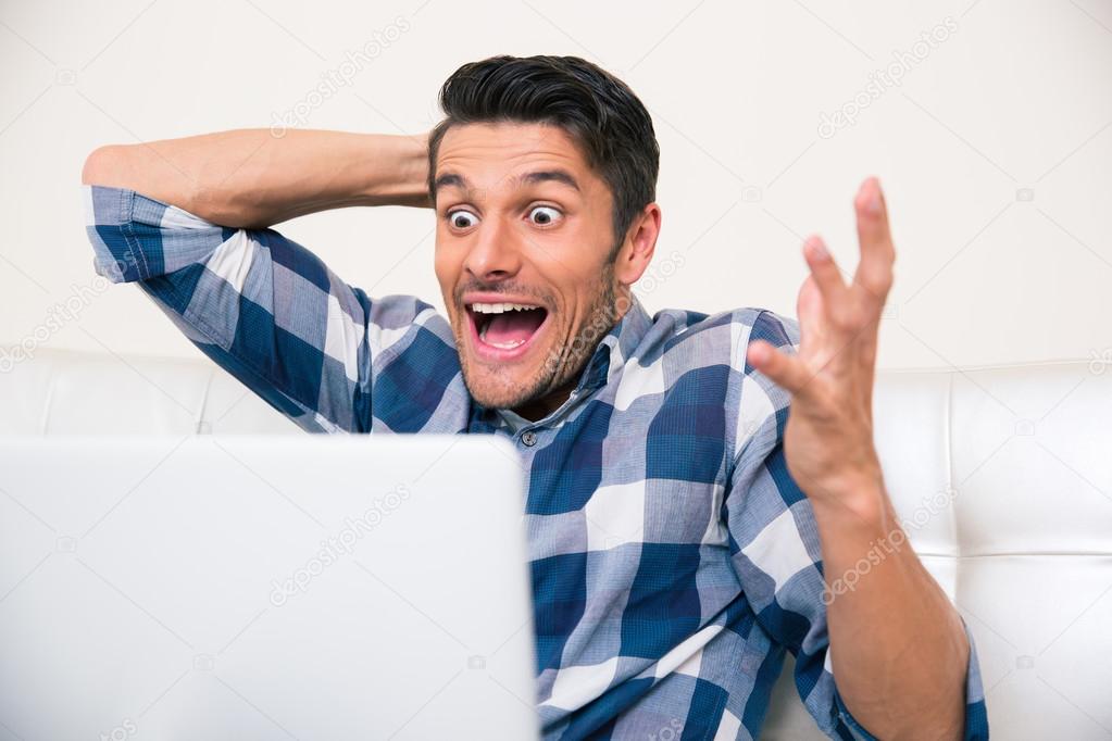Excited Person On Computer