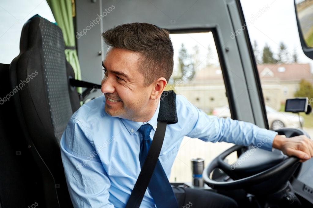 Happy driver driving intercity bus Stock Photo by ©Syda_Productions ...