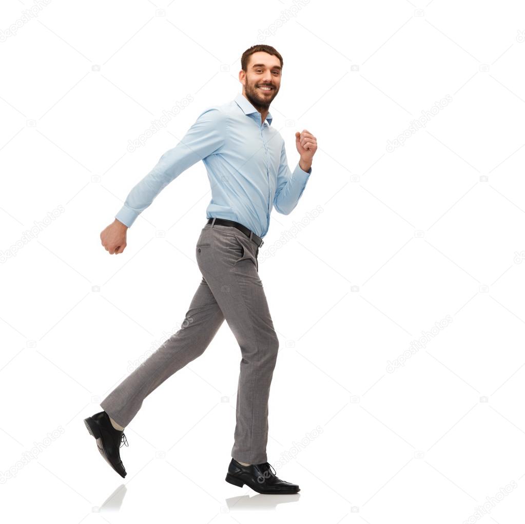 Smiling young man running away — Stock Photo © Syda_Productions #107157230 Smiling young man running away — Stock Photo © Syda_Productions #107157230