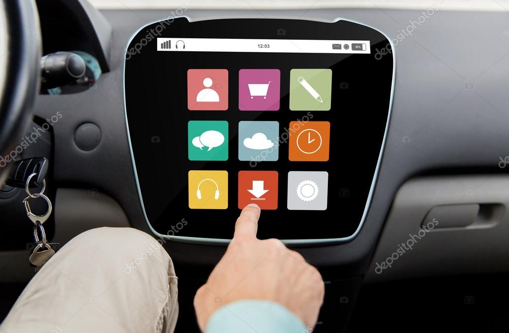 Close up of hand and menu icons on car computer Stock Photo by ©Syda ...