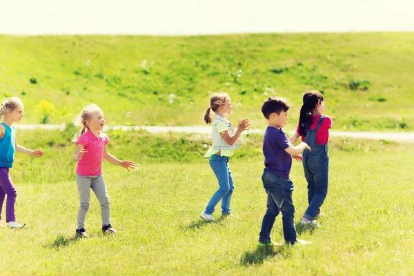 Group of happy kids on children playground — Stock Photo © Syda ...