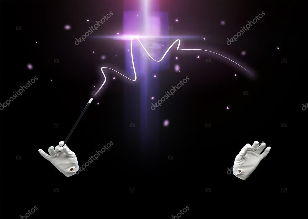 Magician hands with magic wand showing trick Stock Photo by ©Syda ...