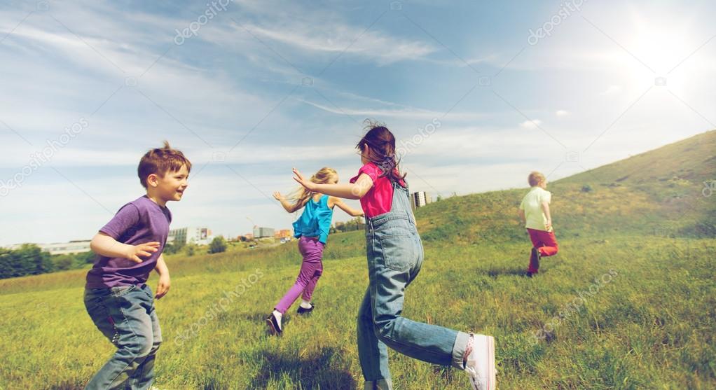 Group of happy kids running outdoors Stock Photo by ©Syda_Productions ...