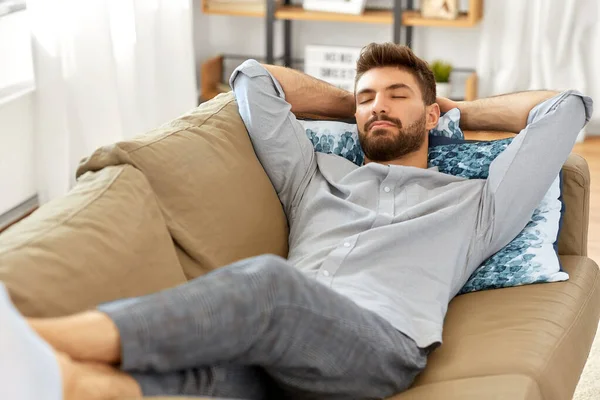 Man sleeping sofa Stock Photos, Royalty Free Man sleeping sofa Images ...