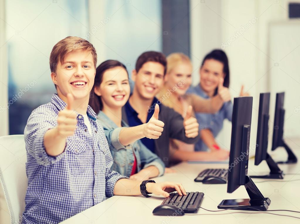 Students with computer monitor showing thumbs up — Stock Photo © Syda ...