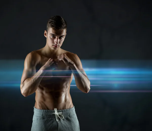 Fitness man torso who is running against dark background Stock Photo by ...