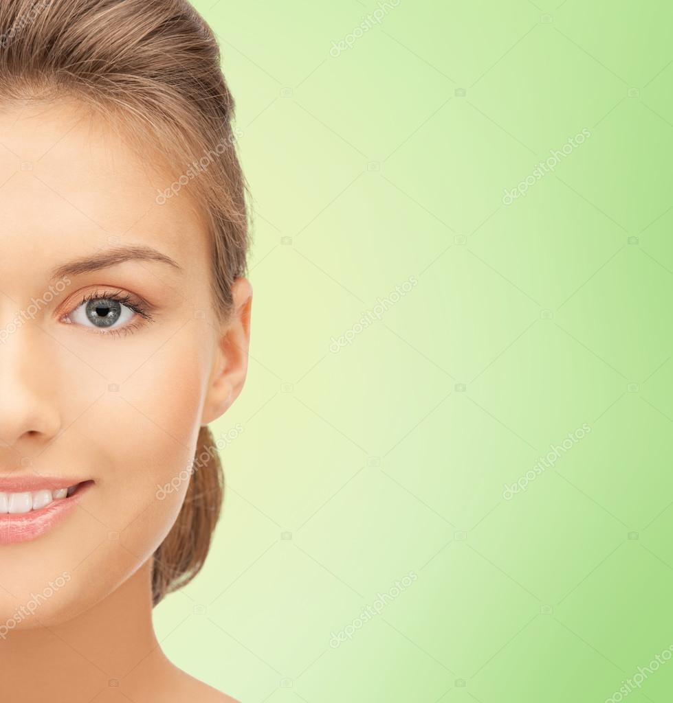 Beautiful young woman half face Stock Photo by ©Syda_Productions 59485185