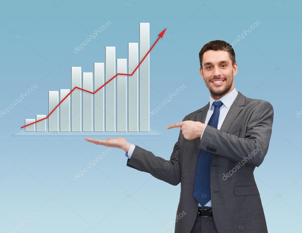Happy man showing growth chart on palm of his hand — Stock Photo © Syda ...