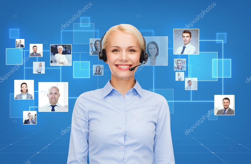 Happy female helpline operator with headphones — Stock Photo © Syda ...