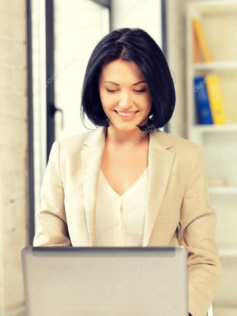 Happy woman with laptop computer — Stock Photo © Syda_Productions #67991417