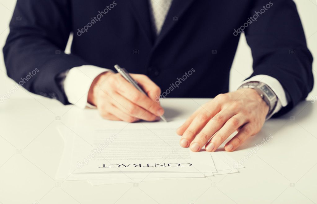 Man signing contract — Stock Photo © Syda_Productions #68953571