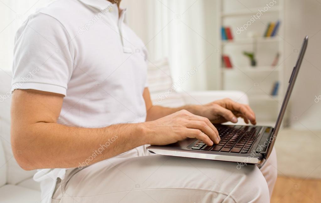Close up of man working with laptop at home — Stock Photo © Syda ...
