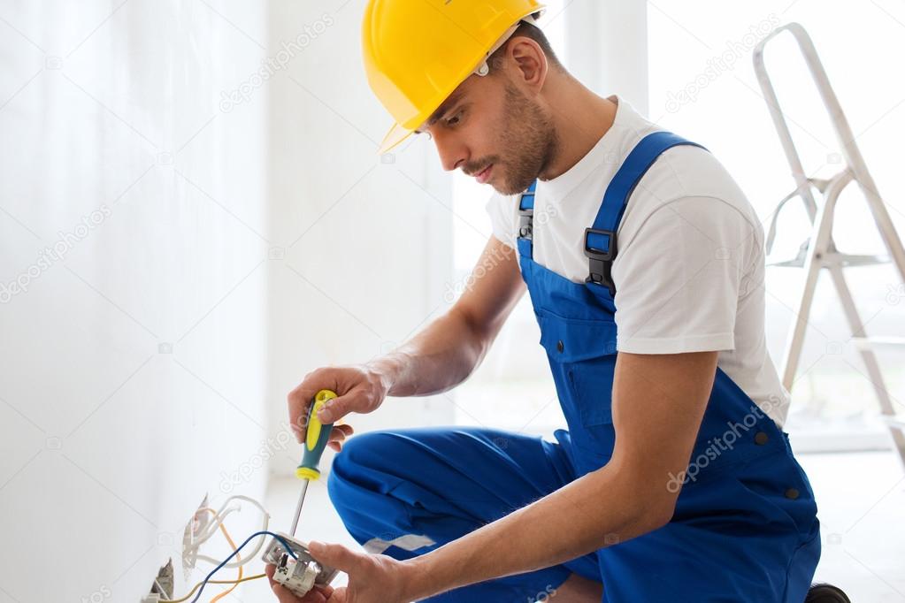 Builder with tablet pc and equipment indoors — Stock Photo © Syda ...