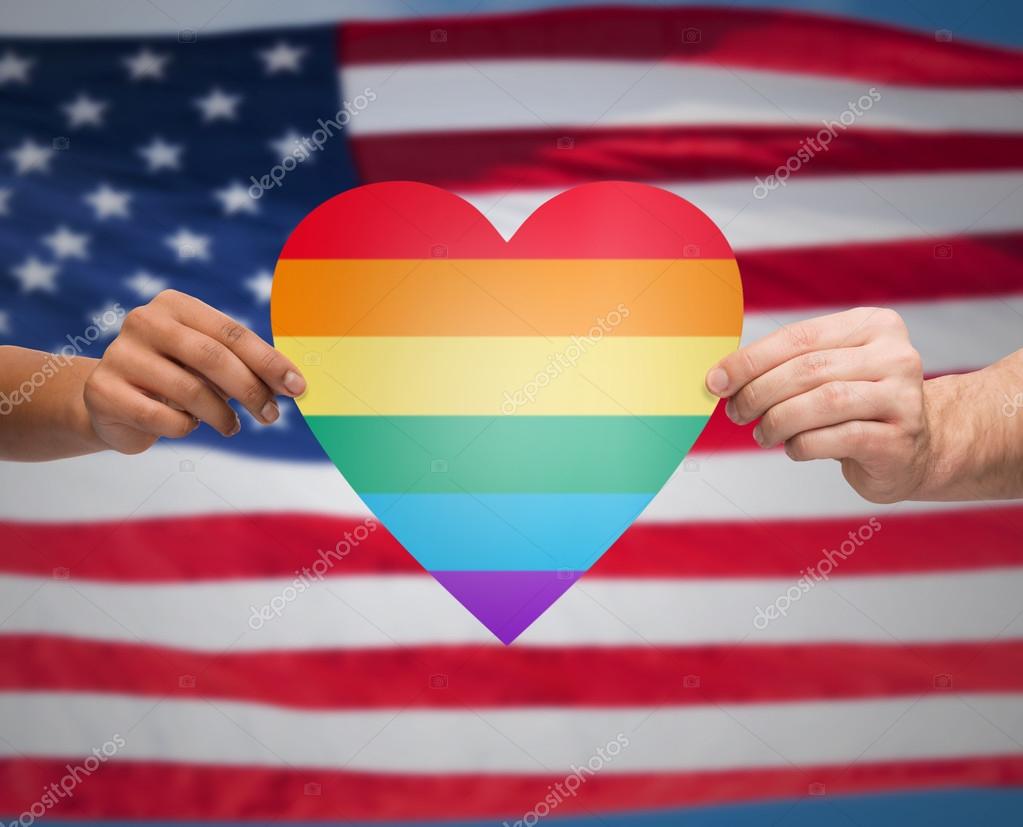 Hands with rainbow heart shape over american flag — Stock Photo © Syda ...