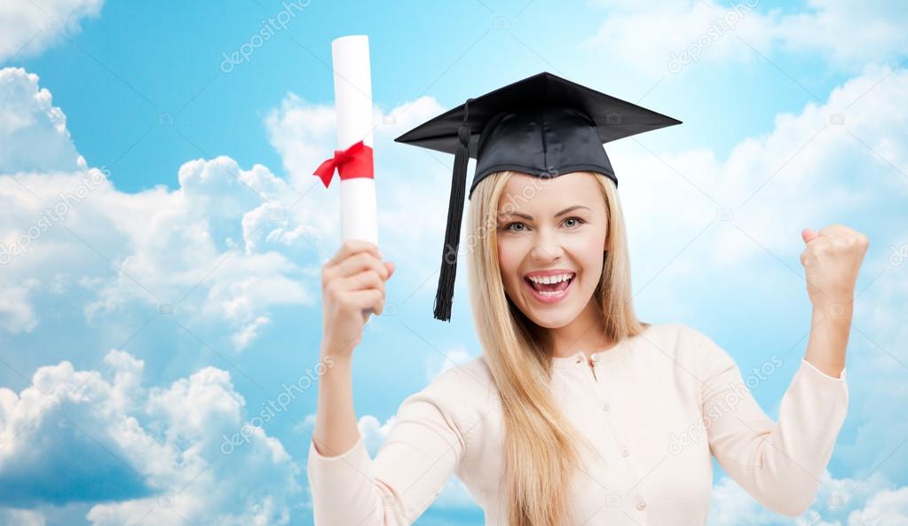 Student in trencher cap with diploma over blue sky — Stock Photo © Syda ...