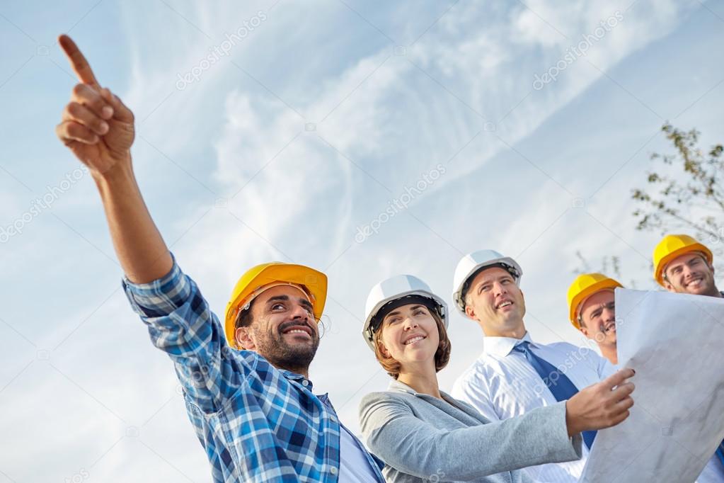 Group of builders and architects with blueprint Stock Photo by ©Syda ...