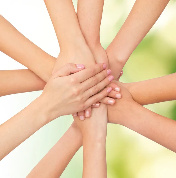 Top view of putting hands on each other — Stock Photo © Dmyrto_Z #77151201