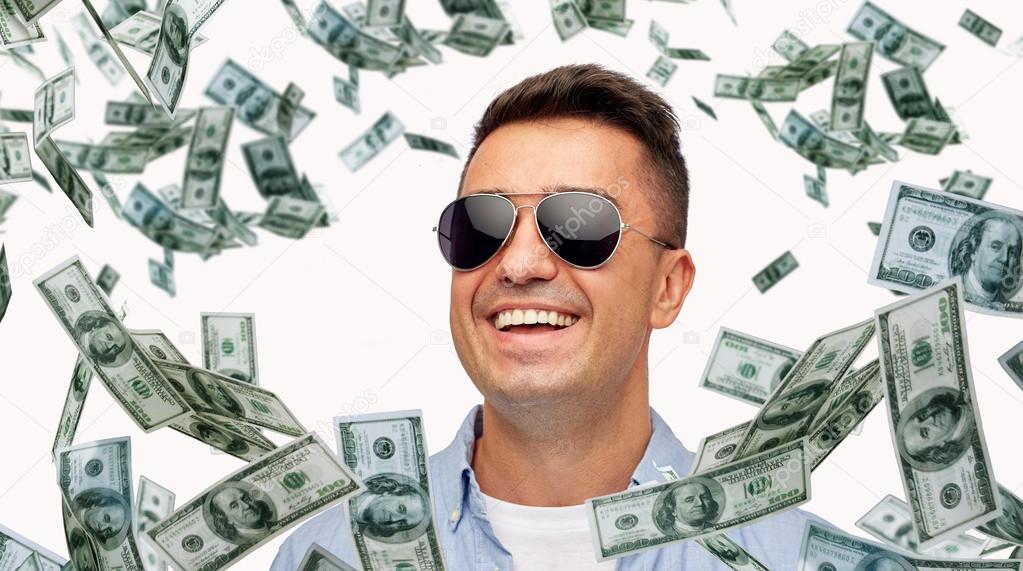 Happy man with falling dollar money — Stock Photo © Syda_Productions ...