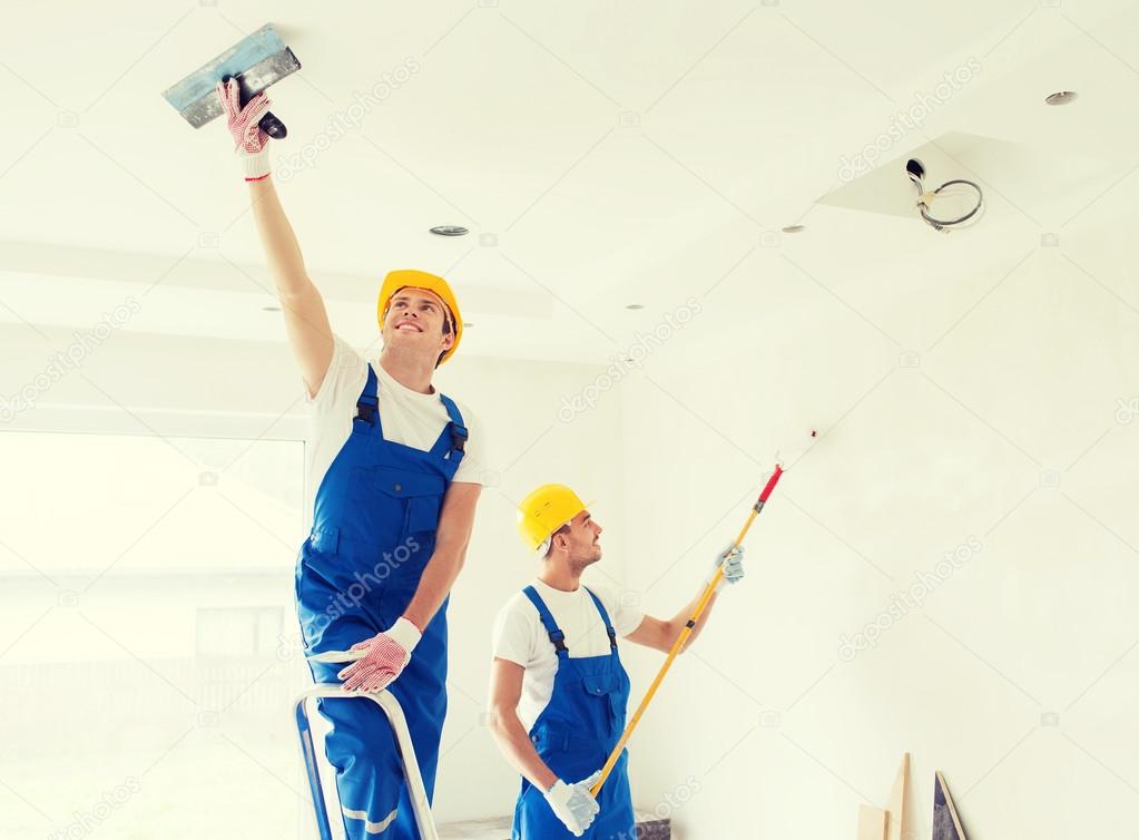 Group of builders with tools indoors — Stock Photo © Syda_Productions ...