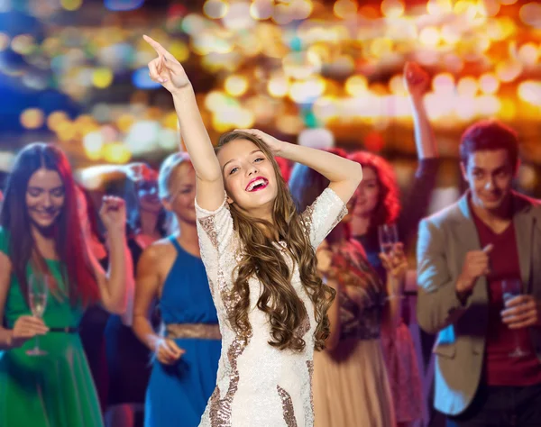 Happy young woman or girl in party dress and crown Stock Photo by ©Syda ...