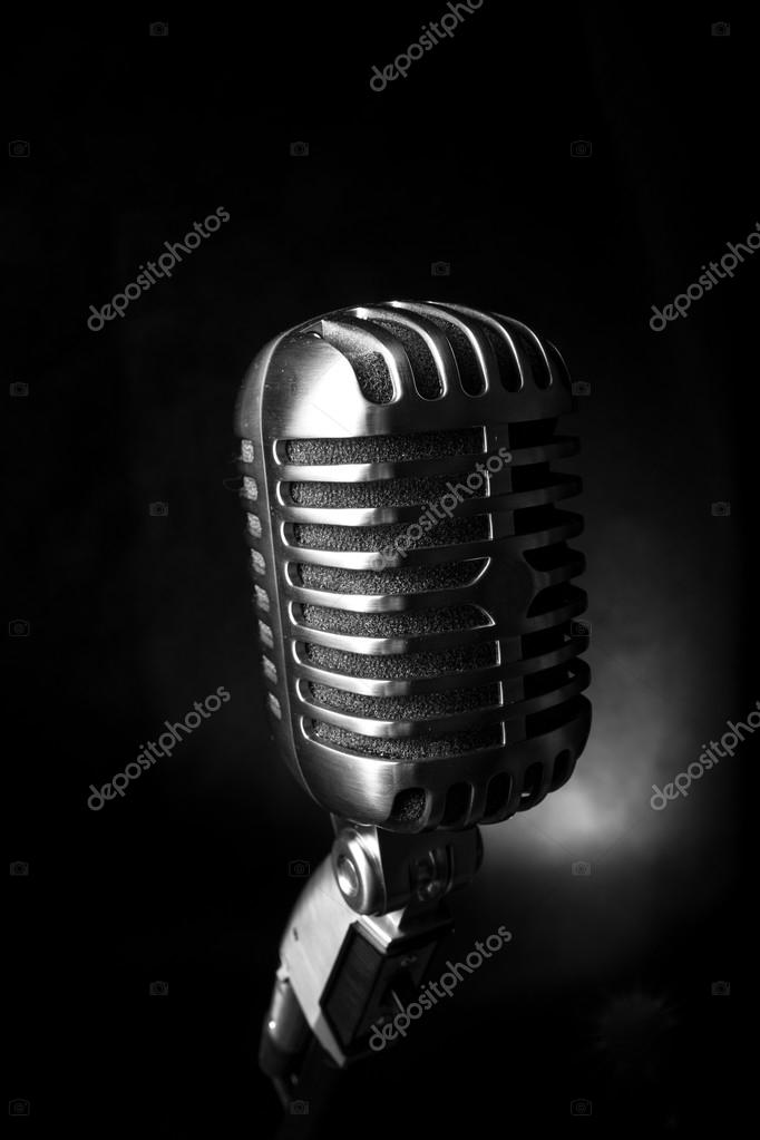 Vintage microphone on black background — Stock Photo © anderm #103334274