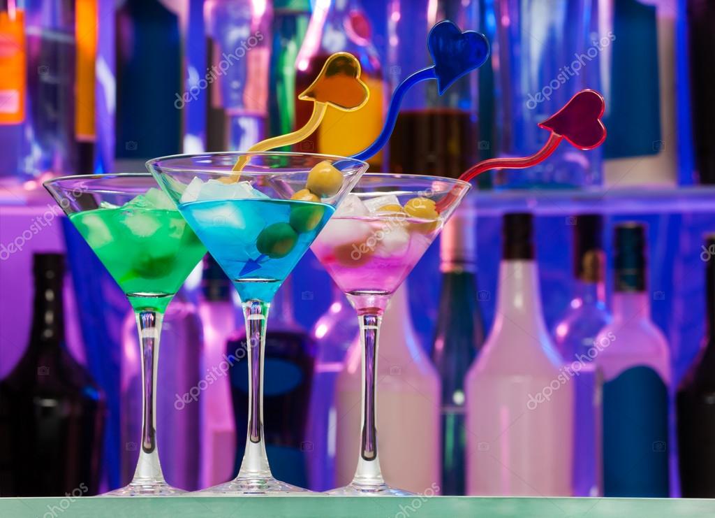 Different cocktail glasses with color drinks Stock Photo by ©serrnovik ...
