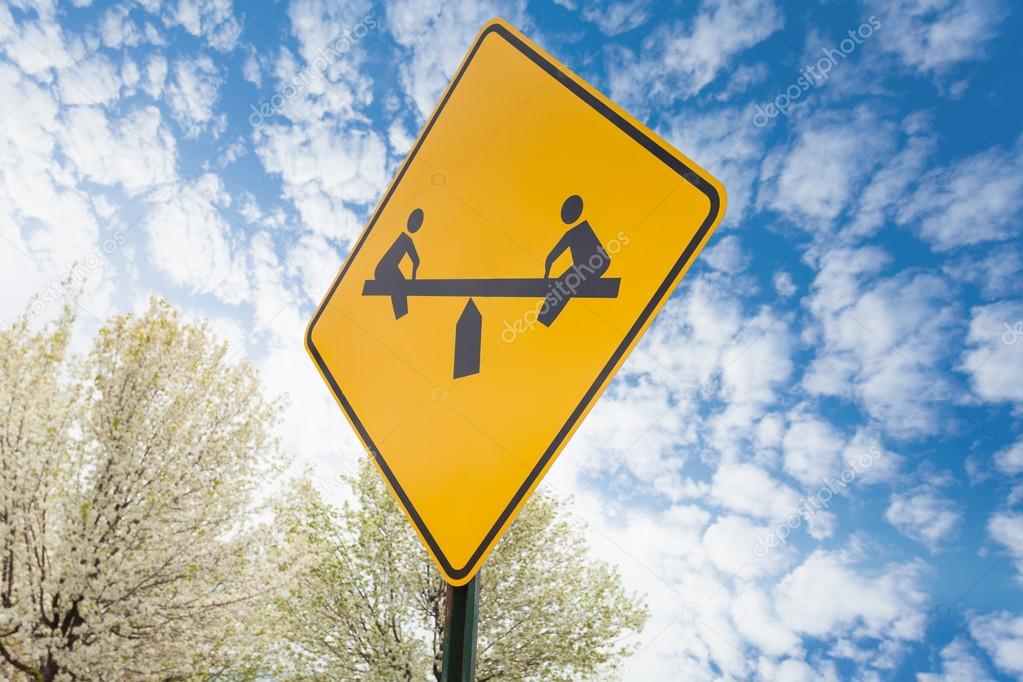 Teeter-totter yellow sign — Stock Photo © serrnovik #101455994