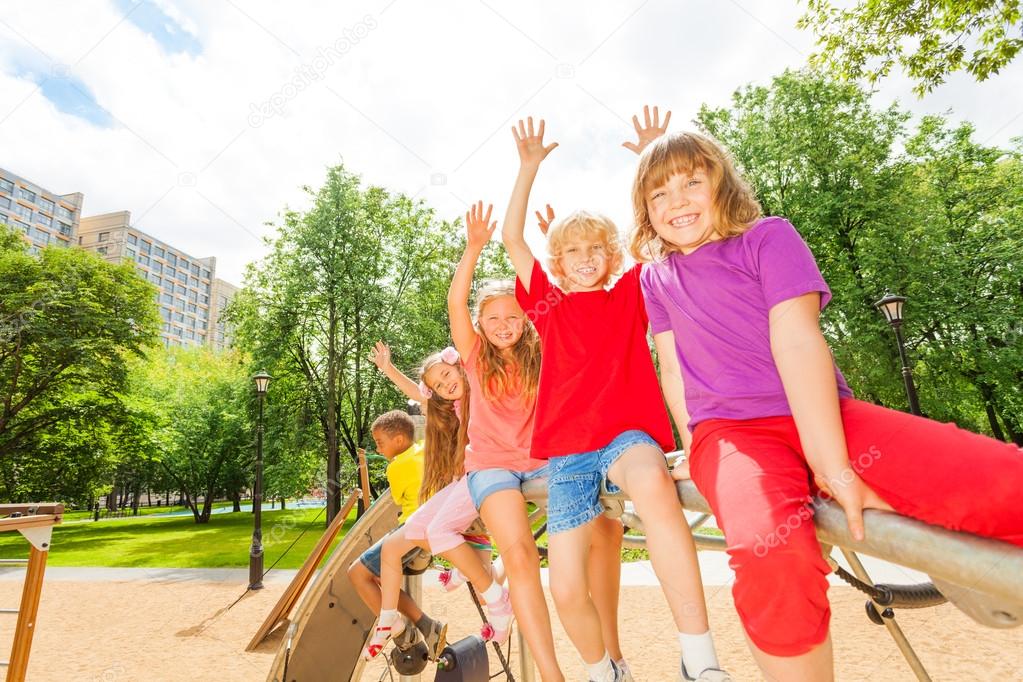 Children sitting in row on round bar ⬇ Stock Photo, Image by ...