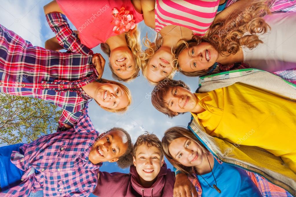 Kids group standing together Stock Photo by ©serrnovik 60874685