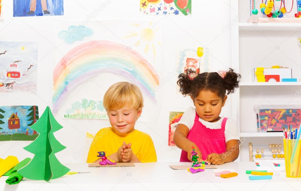 Boy and girl making forms — Stock Photo © serrnovik #60956311