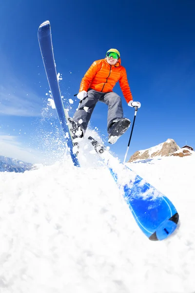 Young man in jump while skiing - Stock Image - Everypixel