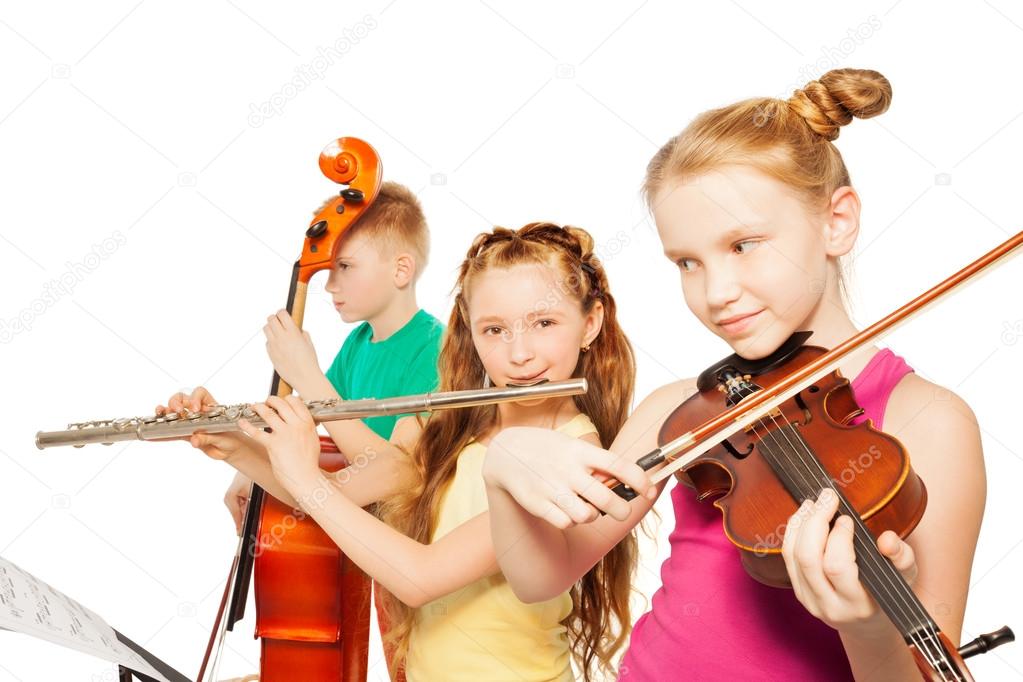 Kids playing musical instruments — Stock Photo © serrnovik #77369082
