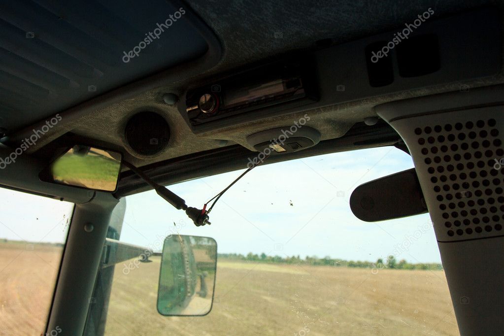 Closeup upper panel in tractor cabin with backview mirror Stock Photo ...