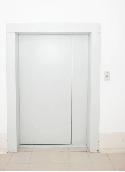Front view of a modern elevator with closed doors - Stock Image ...