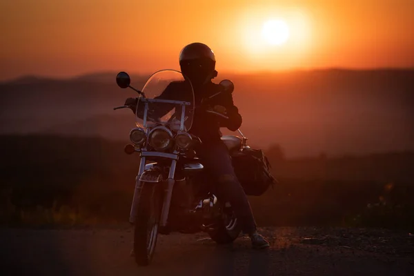 Motorcycle Riding Into Sunset