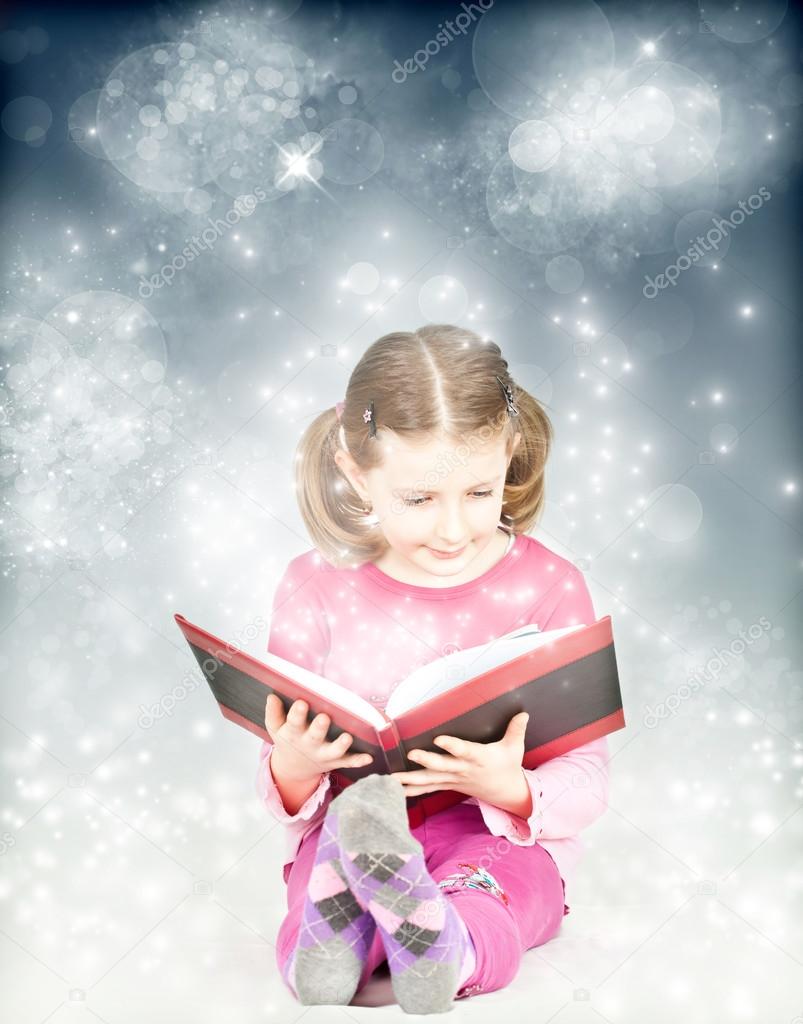 Child reading magic book Stock Photo by ©erika8213 60856167