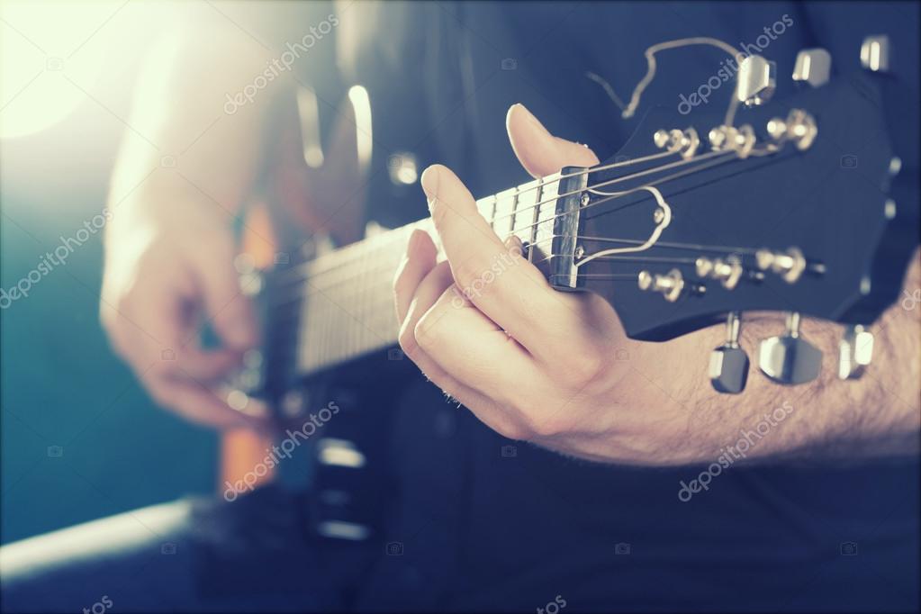 Guitarrista tocando la guitarra: fotografía de stock © erika8213 ...
