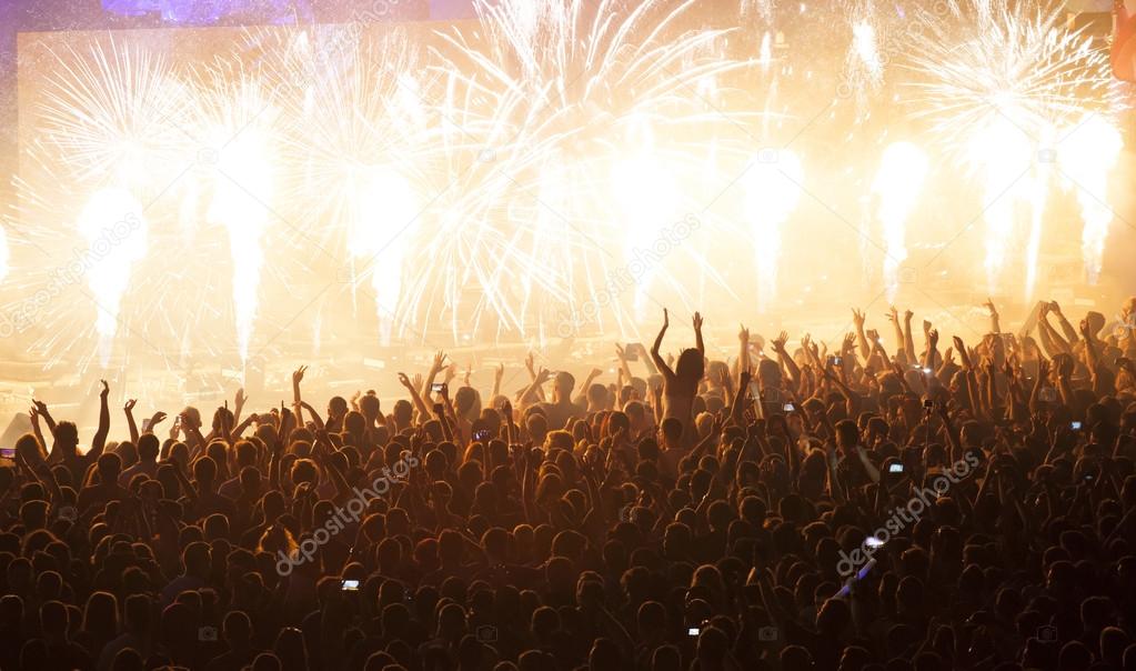 Huge cheering crowd at concert — Stock Photo © erika8213 #90667410