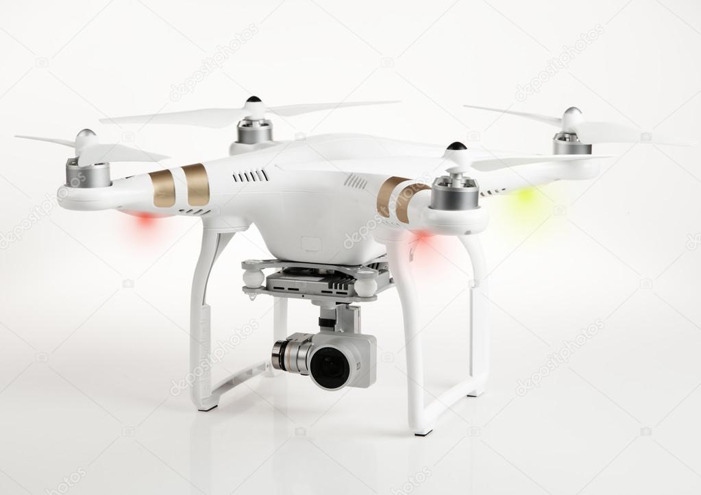 White drone quad copter with 4K digital camera. — Stock Photo © Kesu01 ...