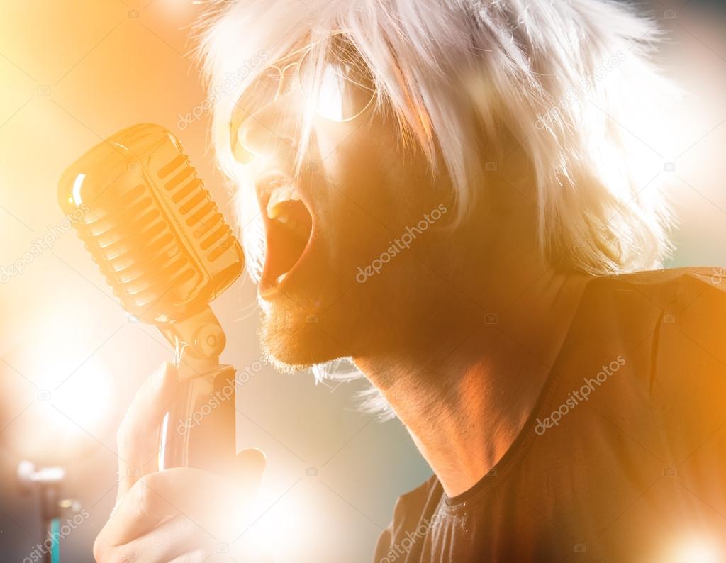 Rock singer screaming — Stock Photo © Kesu01 #53305859