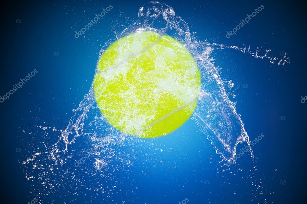 Water splash with sport ball — Stock Photo © Kesu01 #55851119