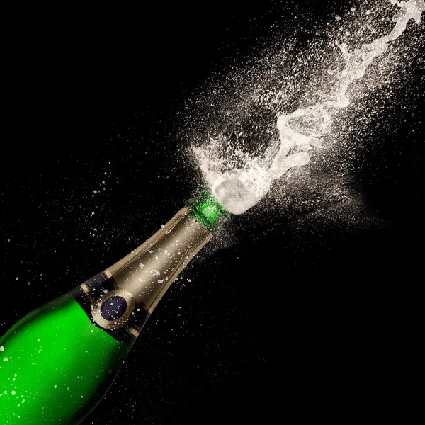 Champagne explosion on black background Stock Photo by ©Kesu01 59204287
